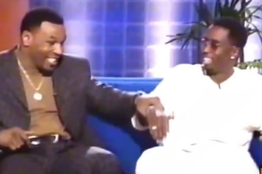 Mike Tyson Moves Diddy's Hand Away From His Leg in Awkward Clip