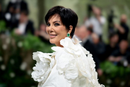Kris Jenner Walks 2024 Met Gala Red Carpet in Bridal-Like White Gown