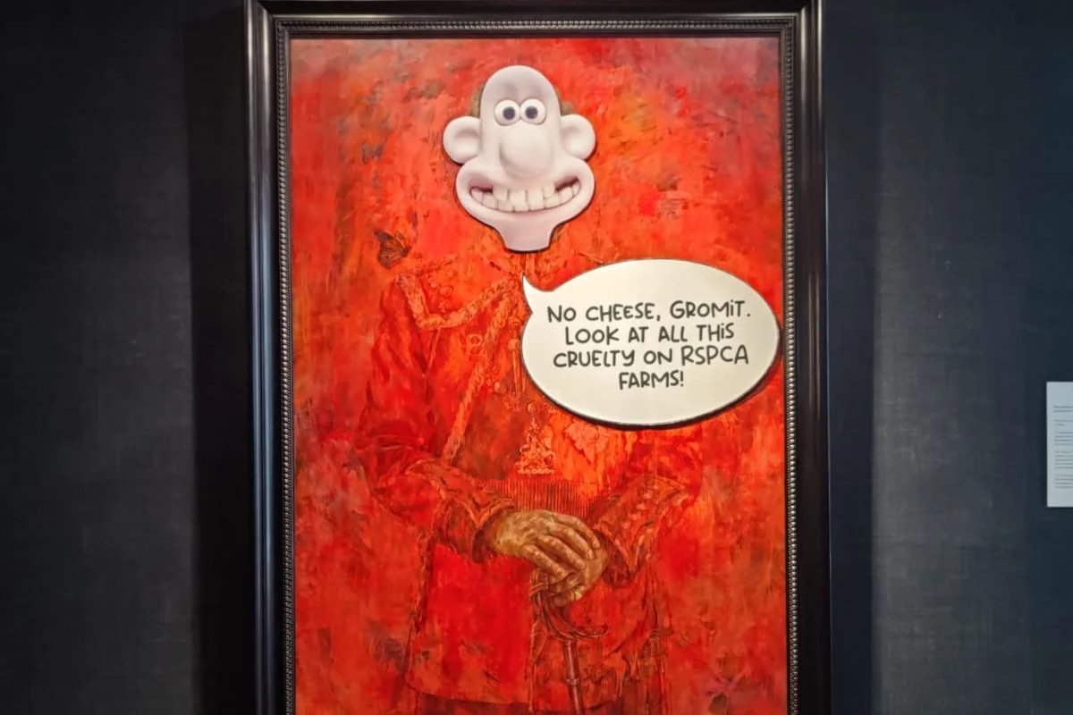King Charles' Red Portrait Vandalized With 'Wallace and Gromit' Cartoon