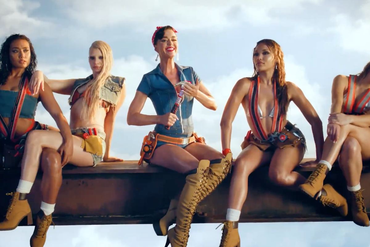 Katy Perry Rocks Rosie Riveter Outfit in ‘Woman’s World’ Tease