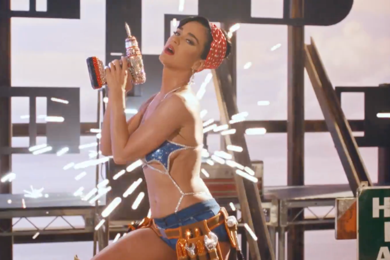Katy Perry Rocks Rosie Riveter Outfit in ‘Woman’s World’ Tease
