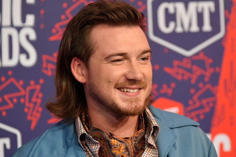 Morgan Wallen Hit by Phone During Concert, Throws It Back