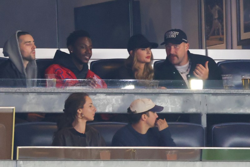 Taylor Swift Kisses and Cuddles Travis Kelce at Yankees Game
