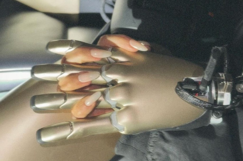 Kim Kardashian Holds Hands With Tesla Robot in Photo Shoot