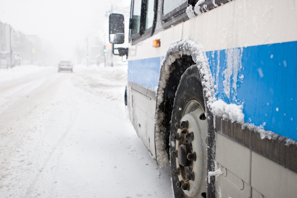 Bus Crashes Into Light Pole on Live TV During Winter Weather Report