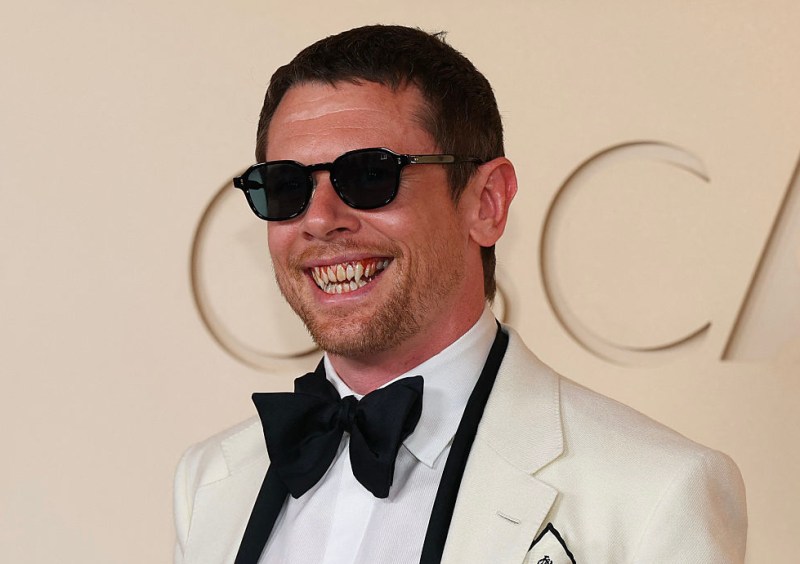 Actor Sports Vampire Fangs on Oscars Red Carpet